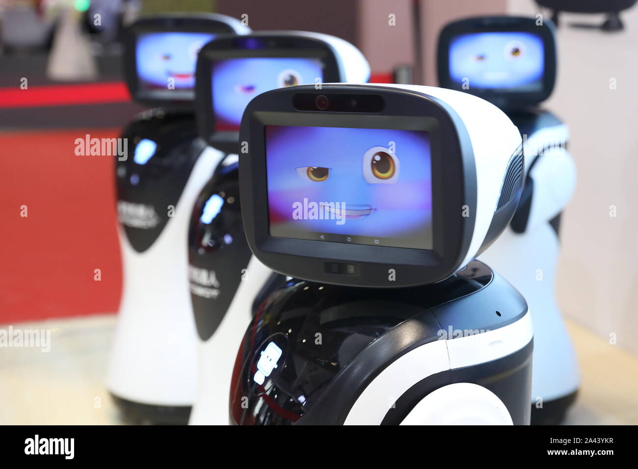 Intelligent robots are displayed at the stand of PadBot during the 2019 ...