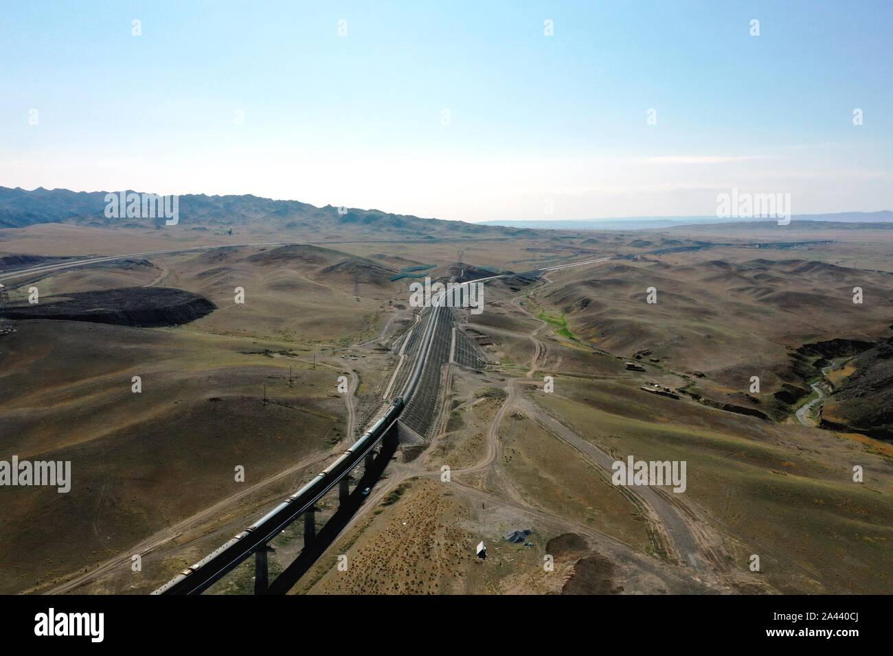 A train runs on the section between Kuytun and Tacheng Prefecture of ...