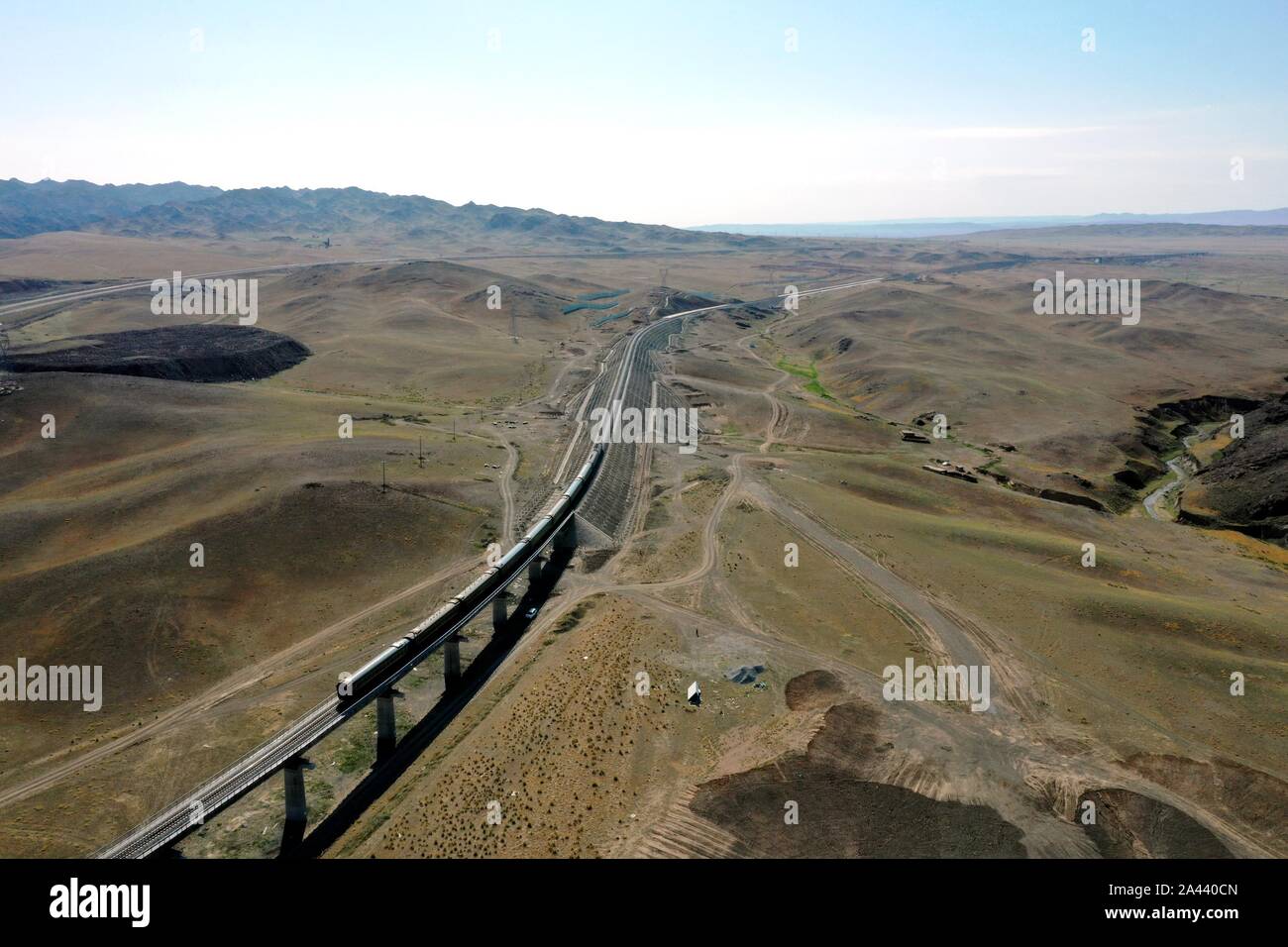 A train runs on the section between Kuytun and Tacheng Prefecture of ...