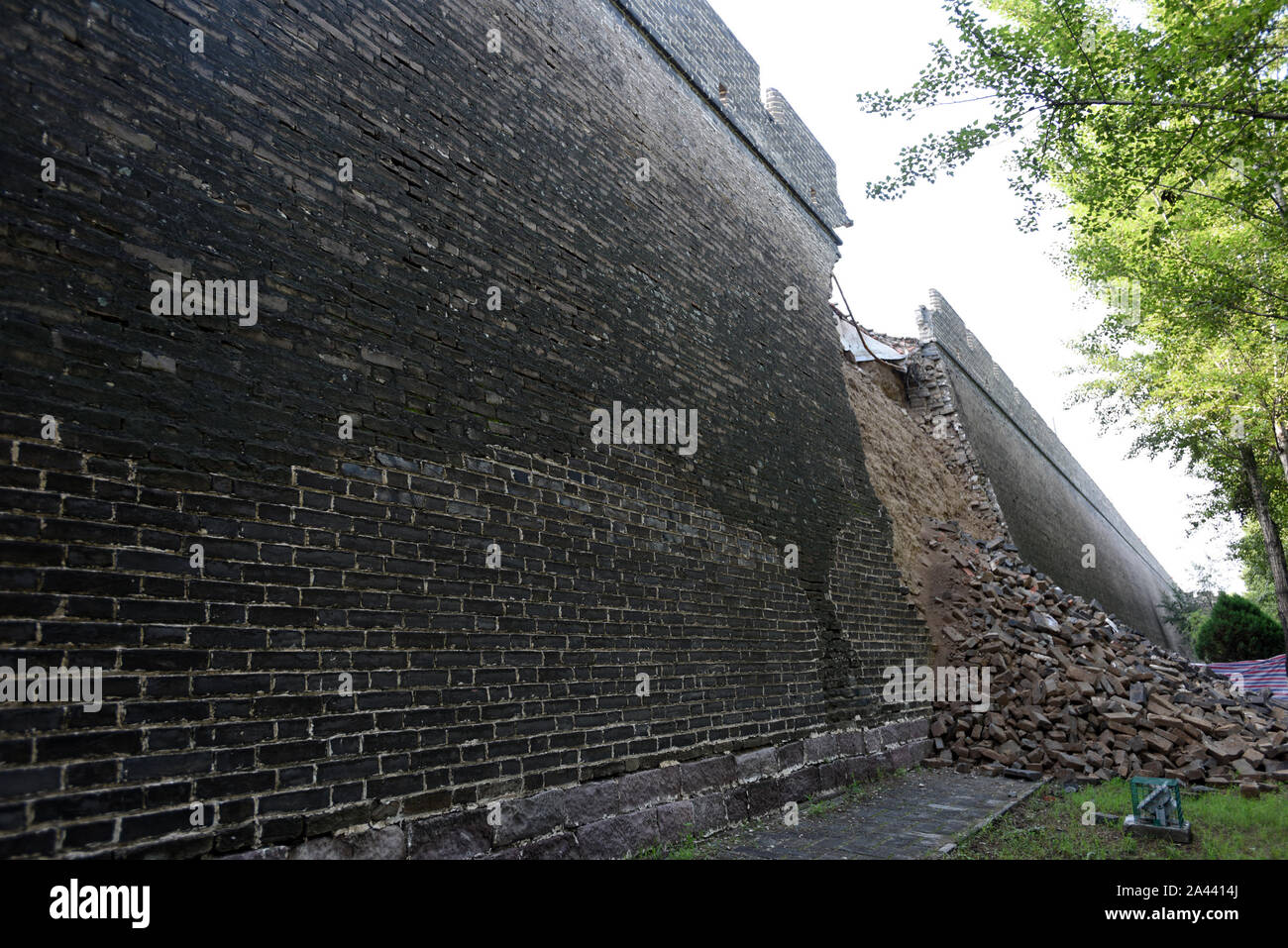 A city wall of Ming dynasty (1368-1644) is collapsed due to continuous ...