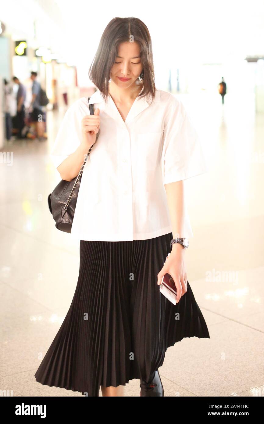 Chinese supermodel Liu Wen arrives at the Beijing Capital International ...