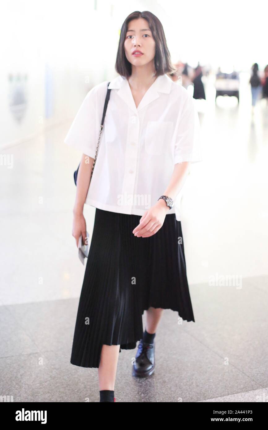 Chinese supermodel Liu Wen arrives at the Beijing Capital International ...