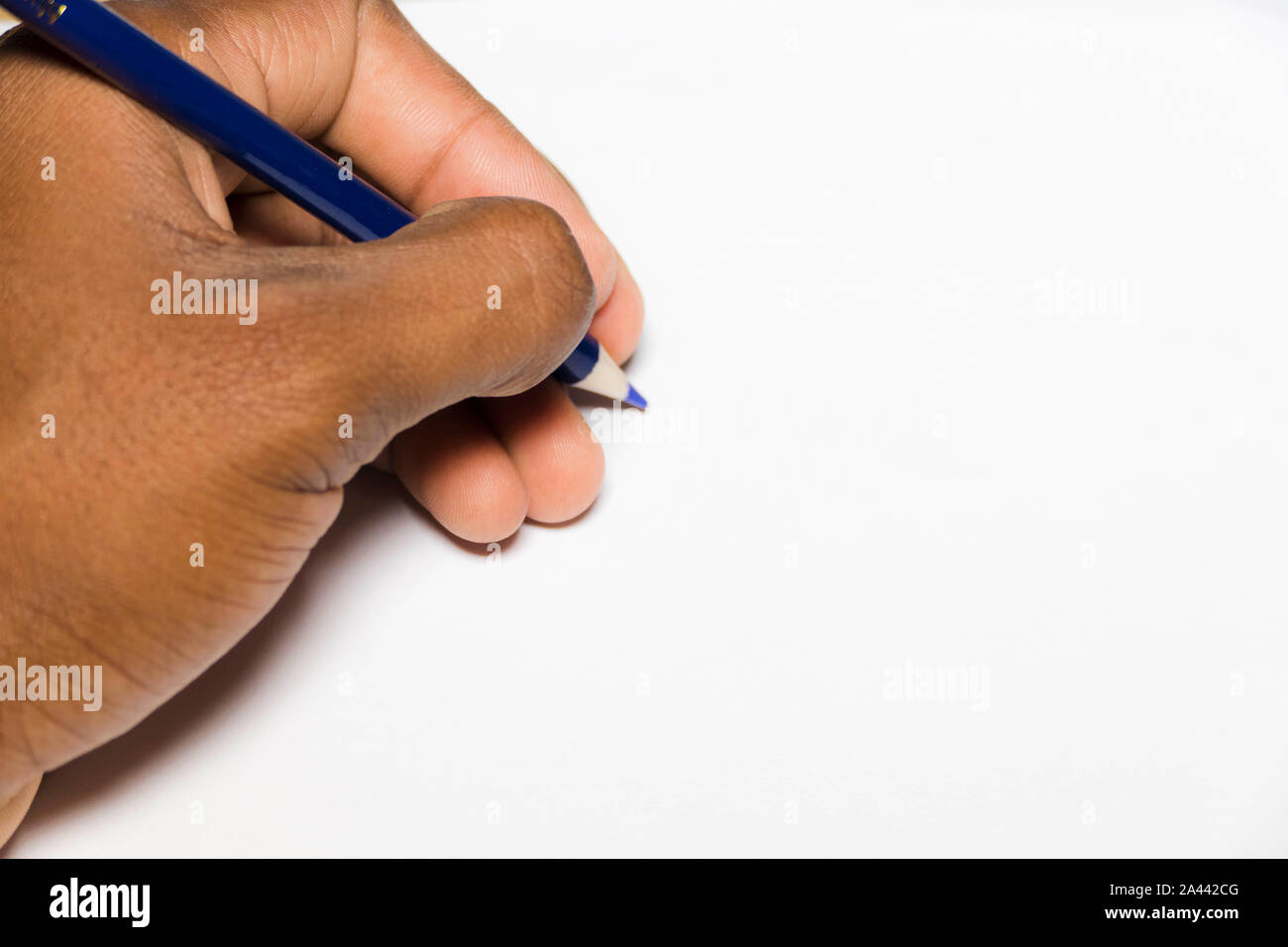 Drawing on white paper with blue color pencil Stock Photo - Alamy