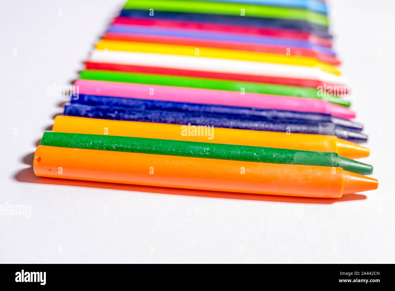 Colorful group of crayons/color pencil laying on the table Stock Photo ...