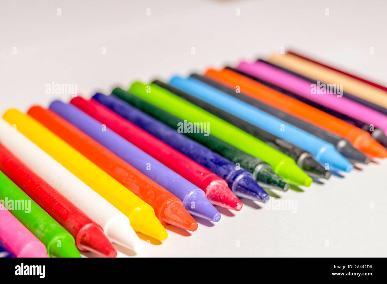 Colorful group of crayons/color pencil laying on the table Stock Photo ...