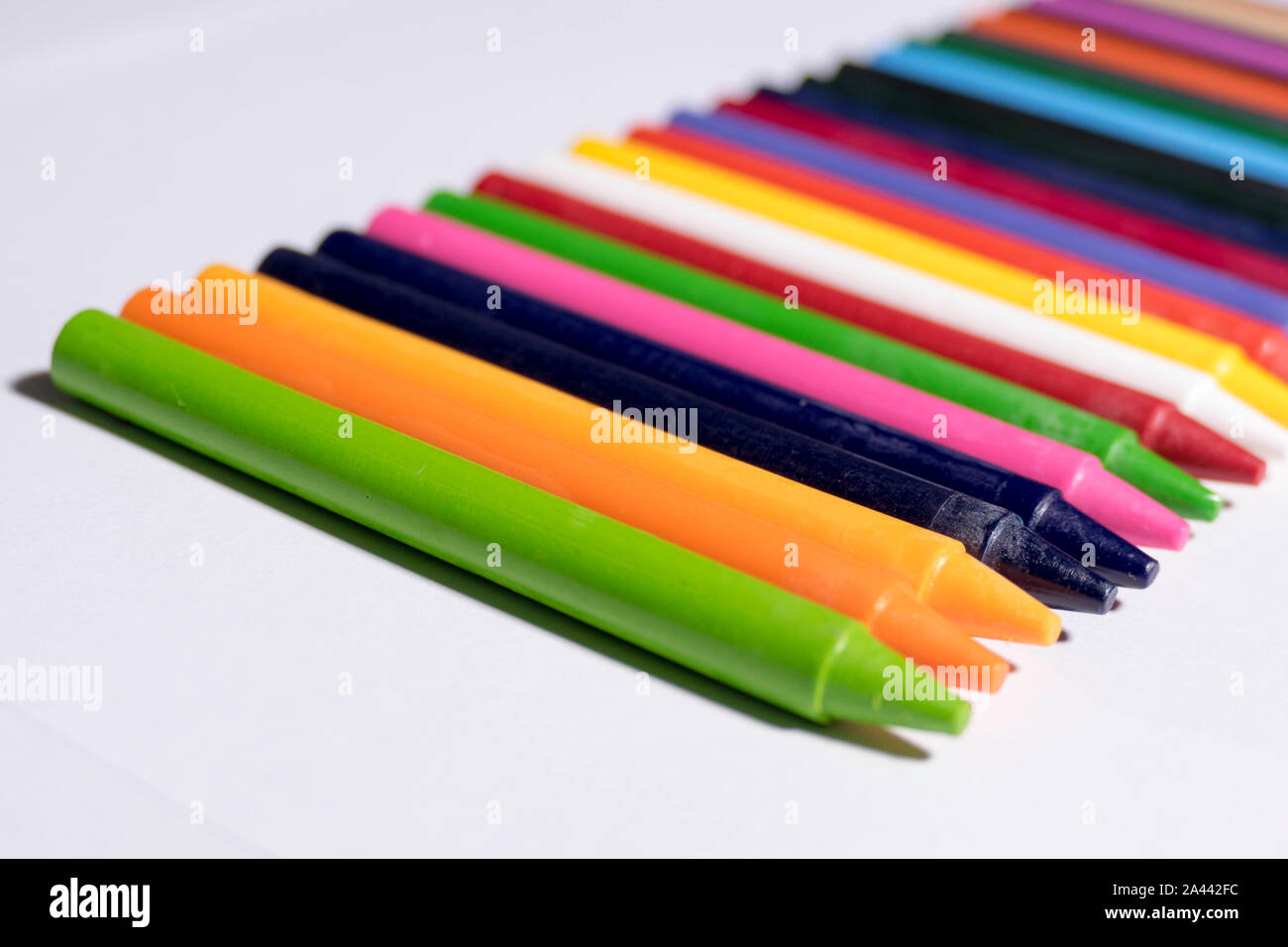 Colorful group of crayons/color pencil laying on the table Stock Photo ...