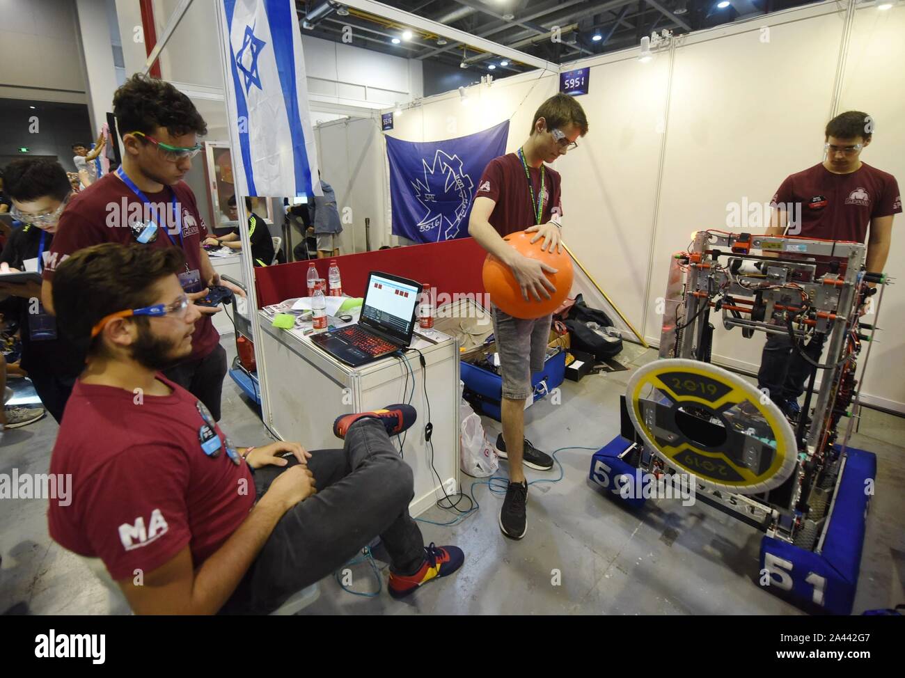Participants test their robots before competition at the second ...