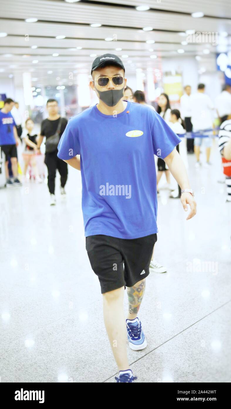 Chinese actor and singer Ohu Ou Hao arrives at the Beijing Capital ...