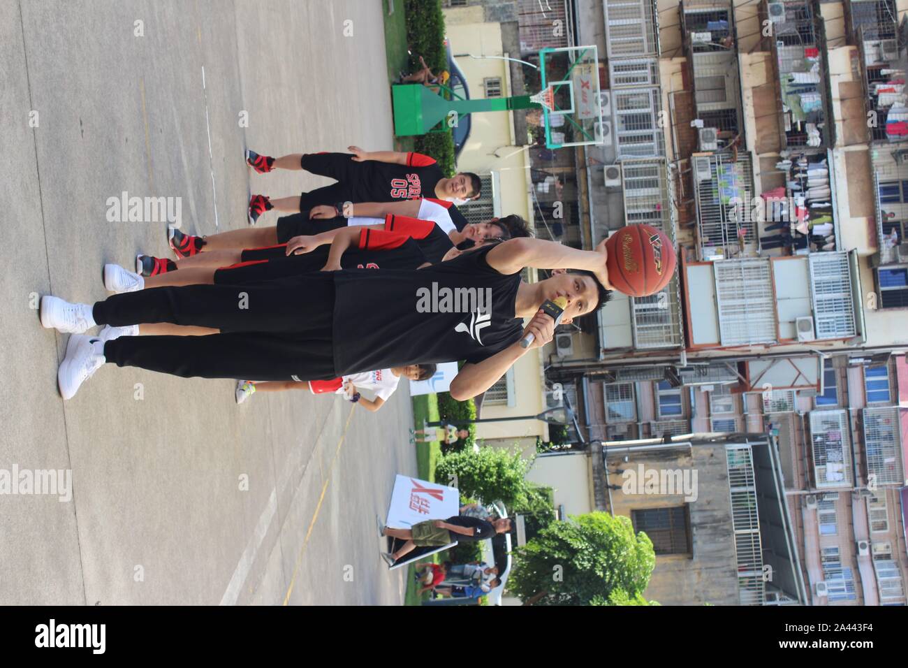 Jeremy Shu-How Lin, or simply Jeremy Lin, front, teaches children ...