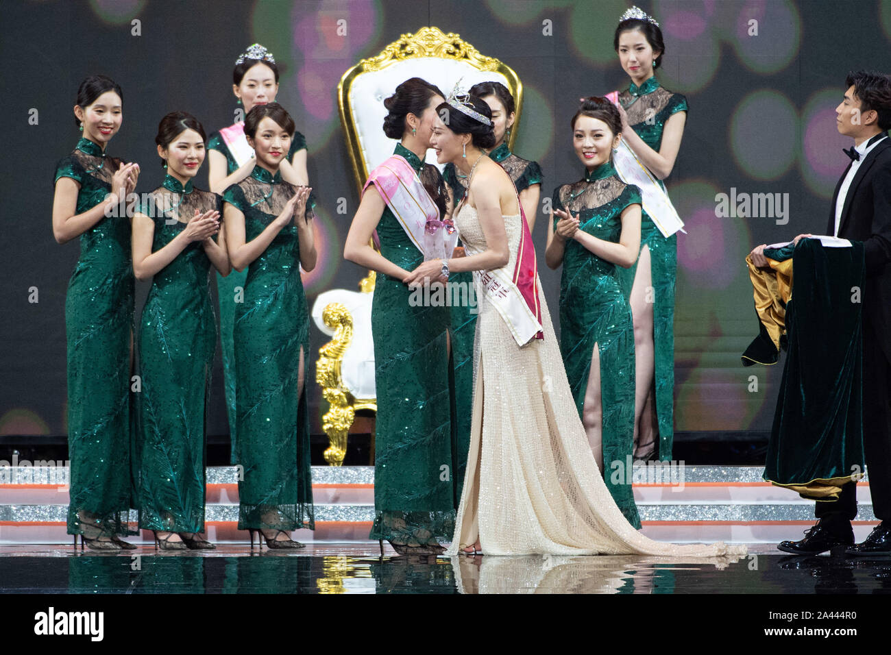 Contestants pose during the 2019 Miss Macau Pageant contest in Macau ...