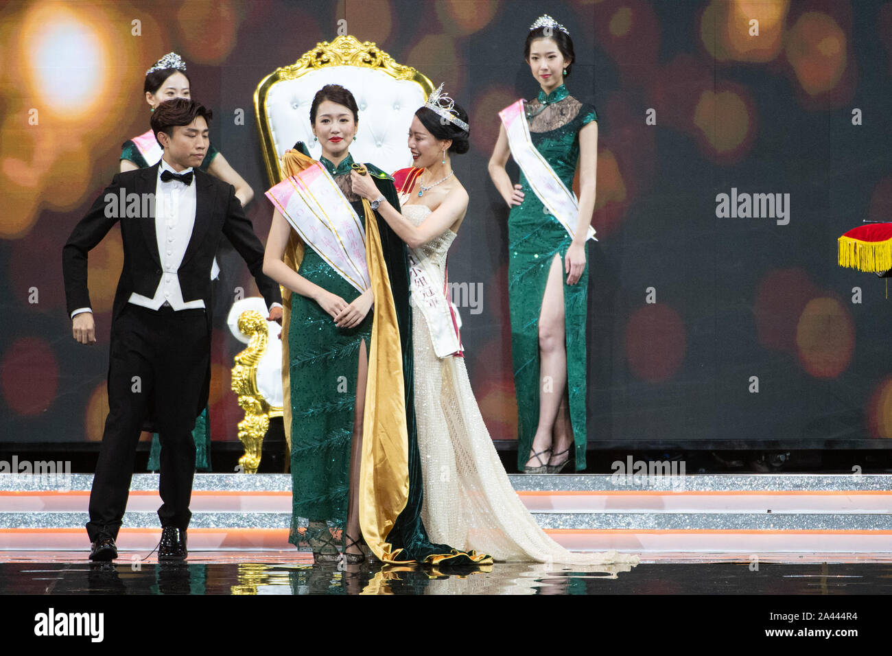 Contestants pose during the 2019 Miss Macau Pageant contest in Macau ...