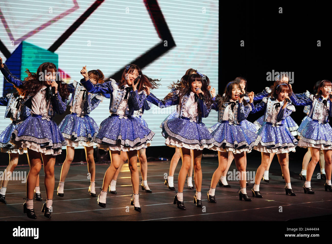 Members of Chinese idol girl group AKB48 Team SH, an official sister ...
