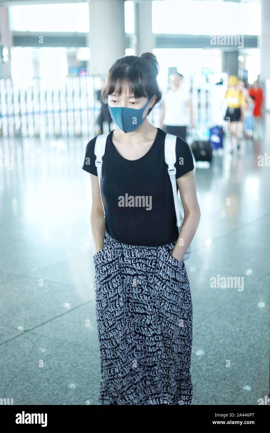 Chinese actress Jiao Junyan arrives at the Beijing Capital ...