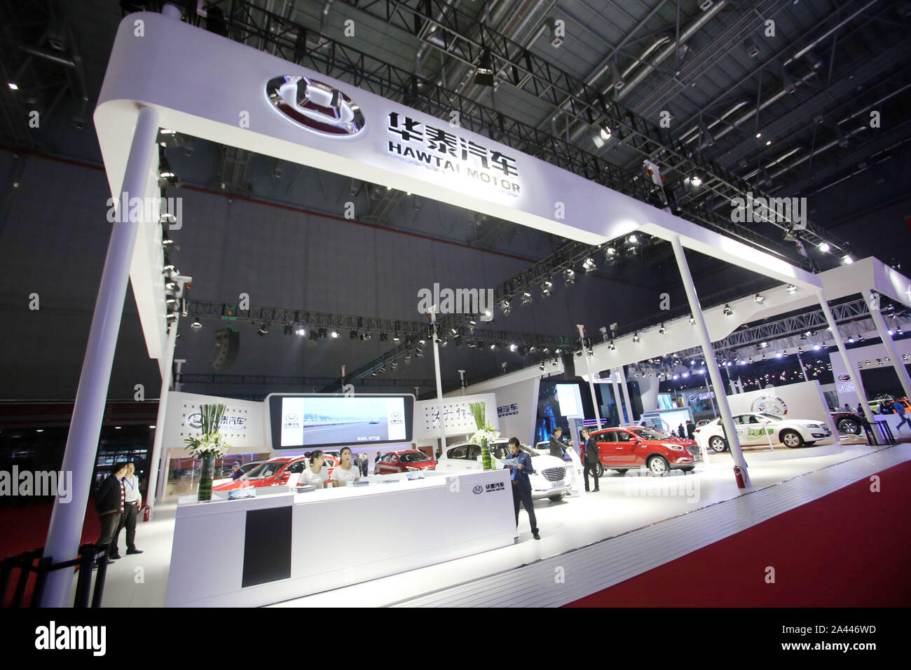 --FILE--People visit the stand of Hawtai Motor during the 16th Shanghai ...