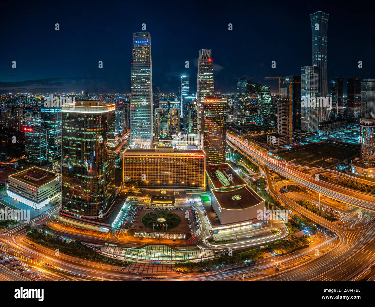 A cityscape at night of the CBD (Central Business District) with China ...