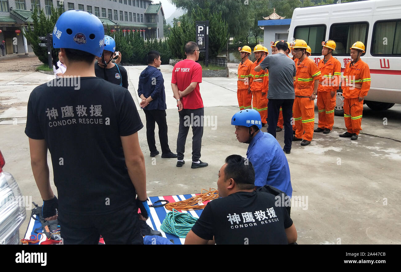 Picture of Condor Rescue team, left black, and local fire brigade ...