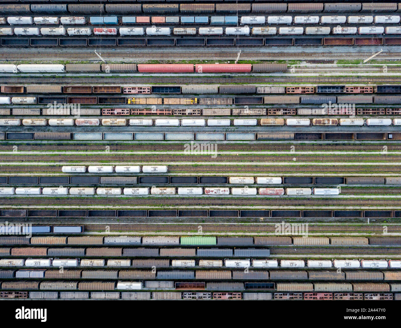 An aerial view of railway trains parked at a classification yard or ...