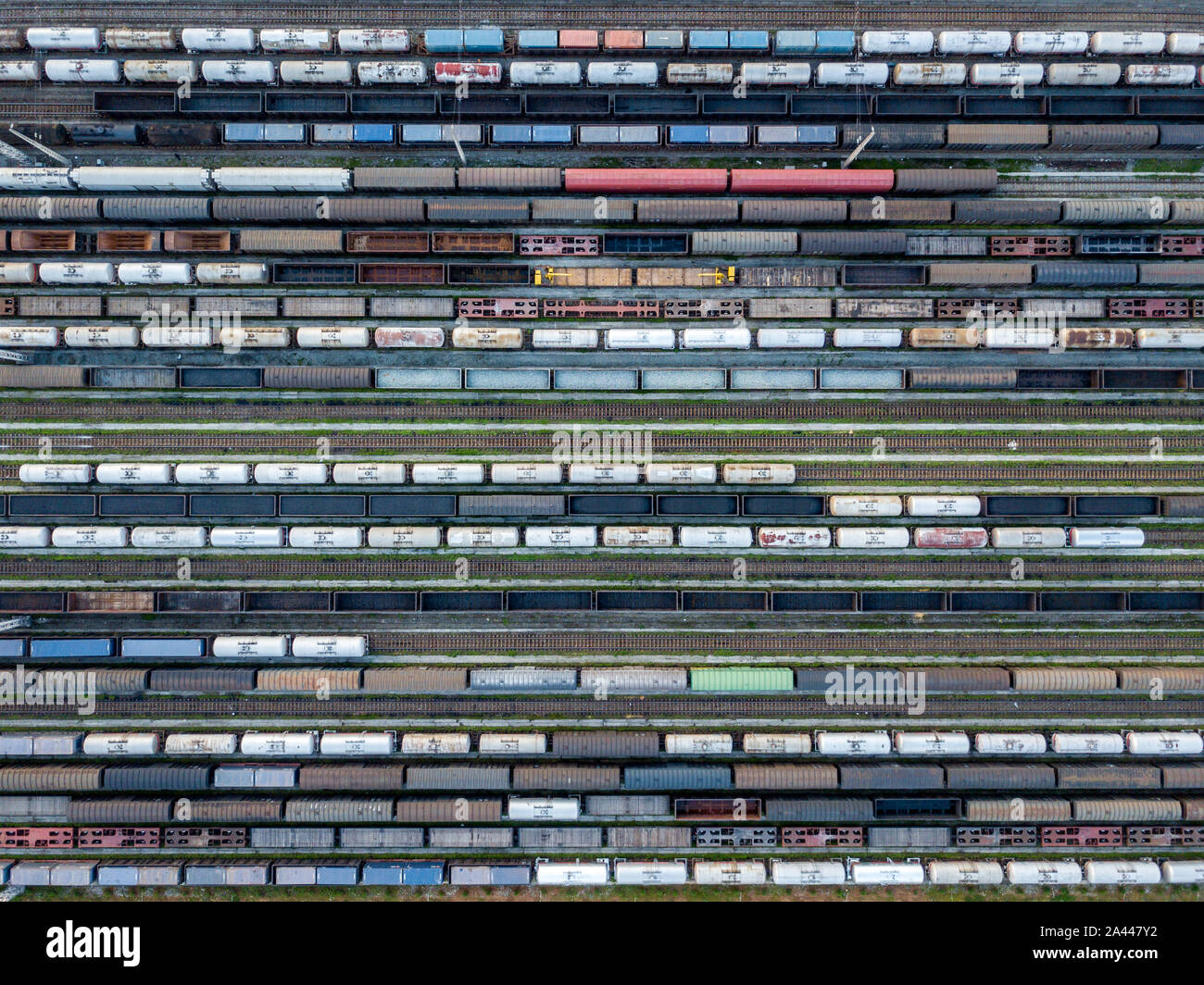 An aerial view of railway trains parked at a classification yard or ...