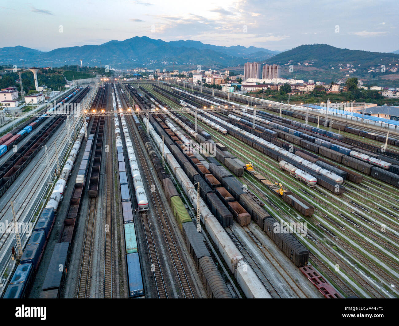 An aerial view of railway trains parked at a classification yard or ...