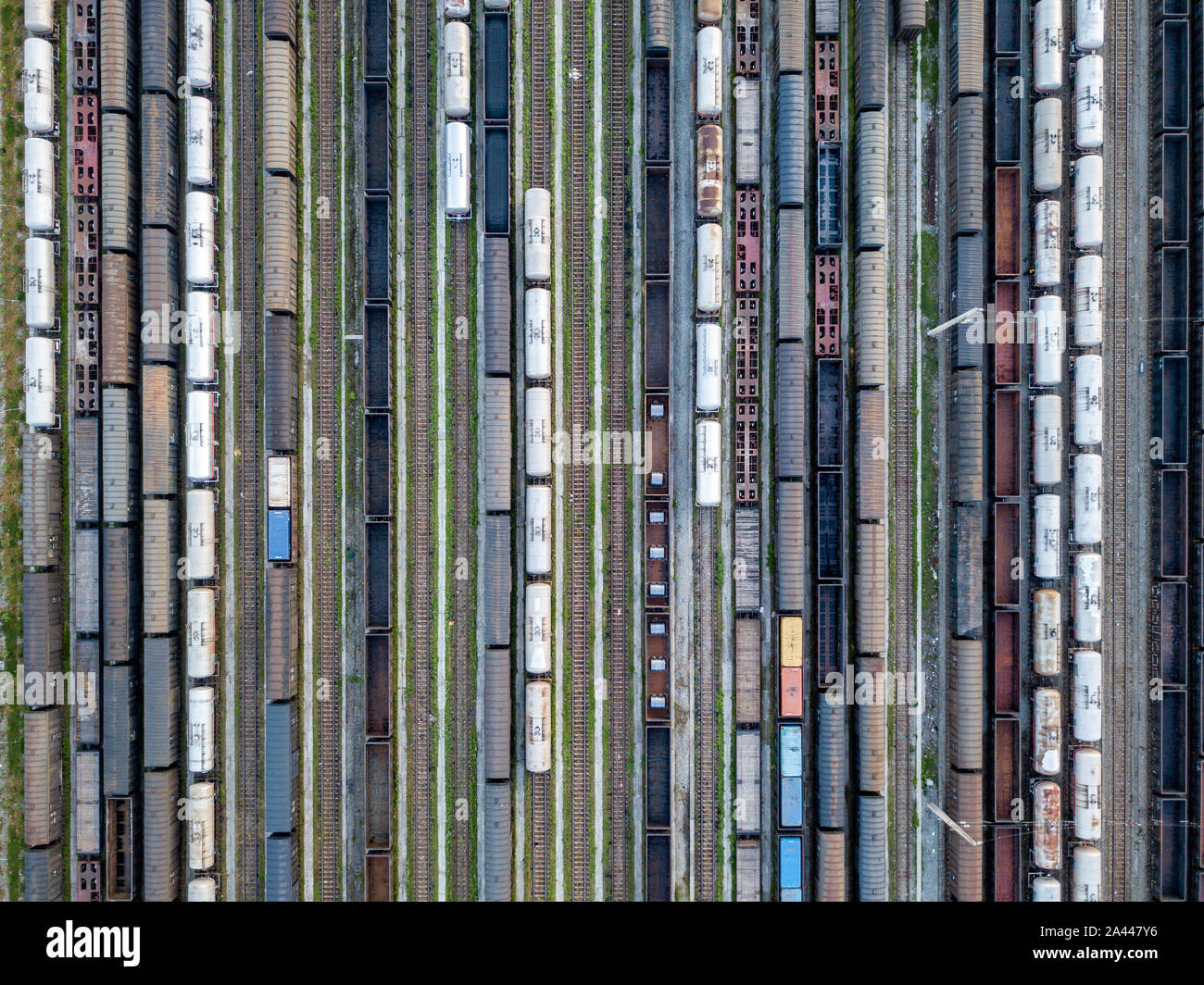 An aerial view of railway trains parked at a classification yard or ...