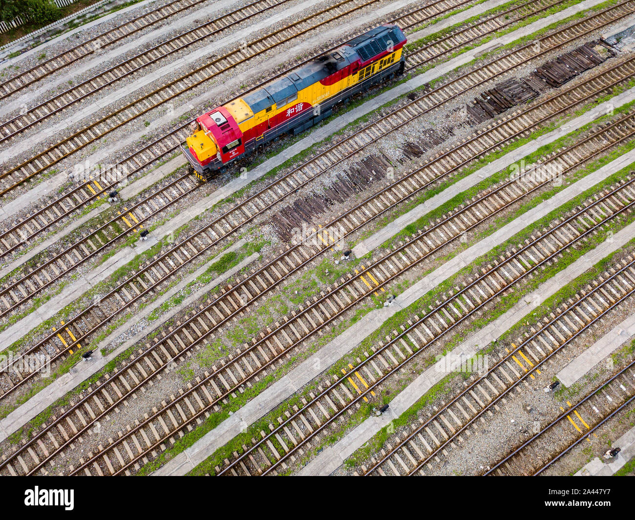 An aerial view of railway trains parked at a classification yard or ...
