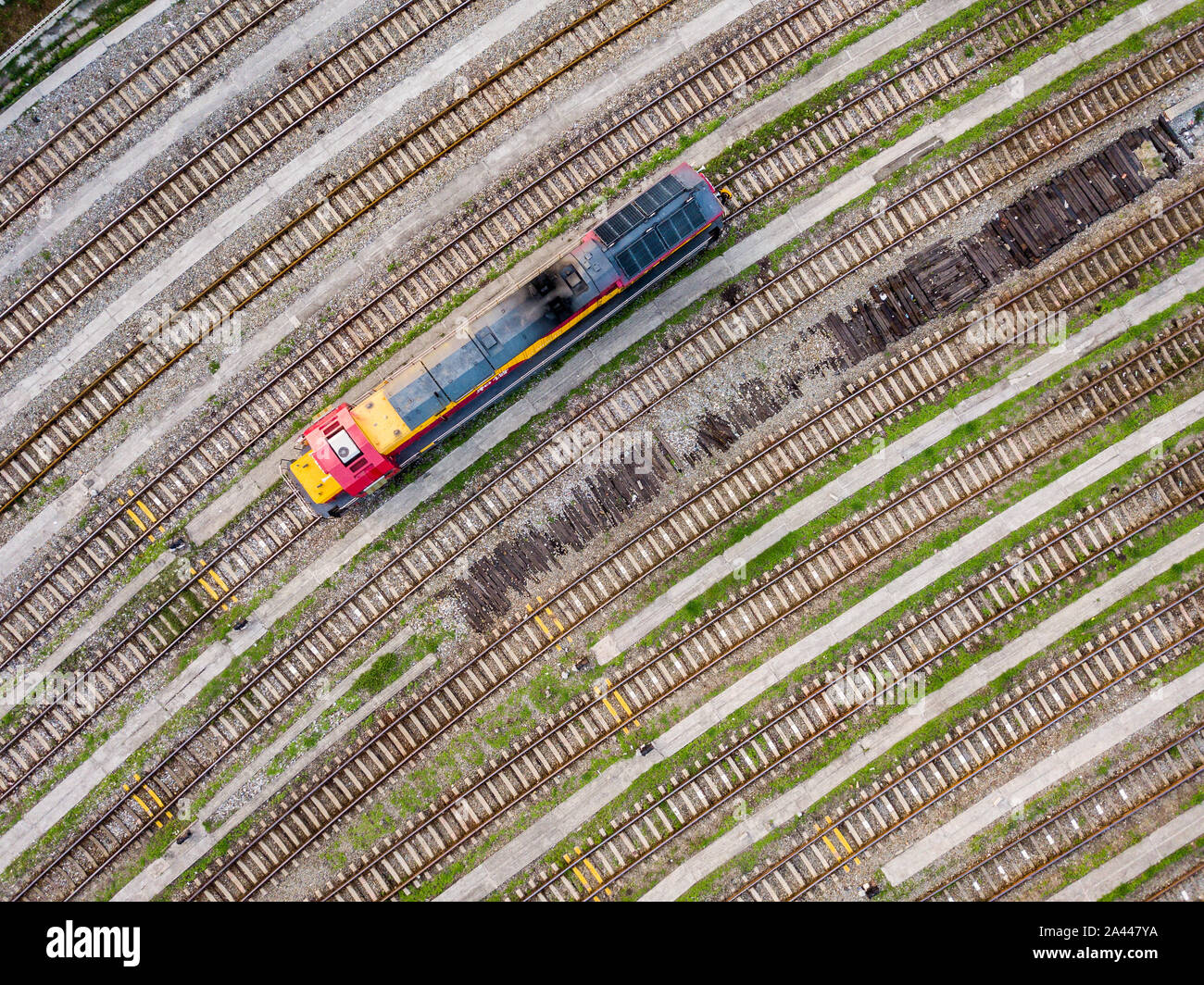 An aerial view of railway trains parked at a classification yard or ...