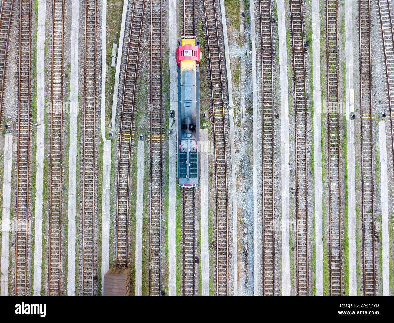 An aerial view of railway trains parked at a classification yard or ...