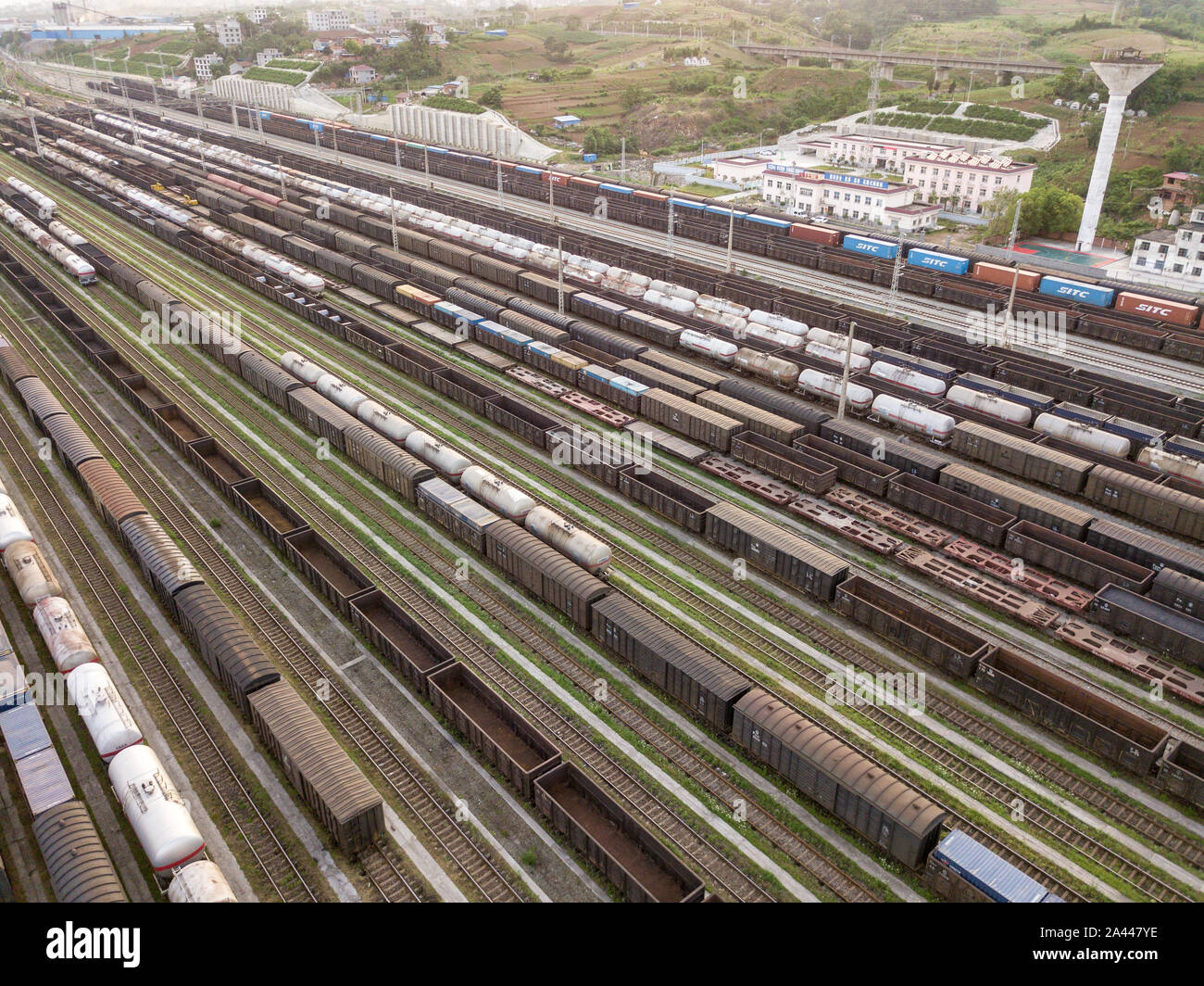 An aerial view of railway trains parked at a classification yard or ...