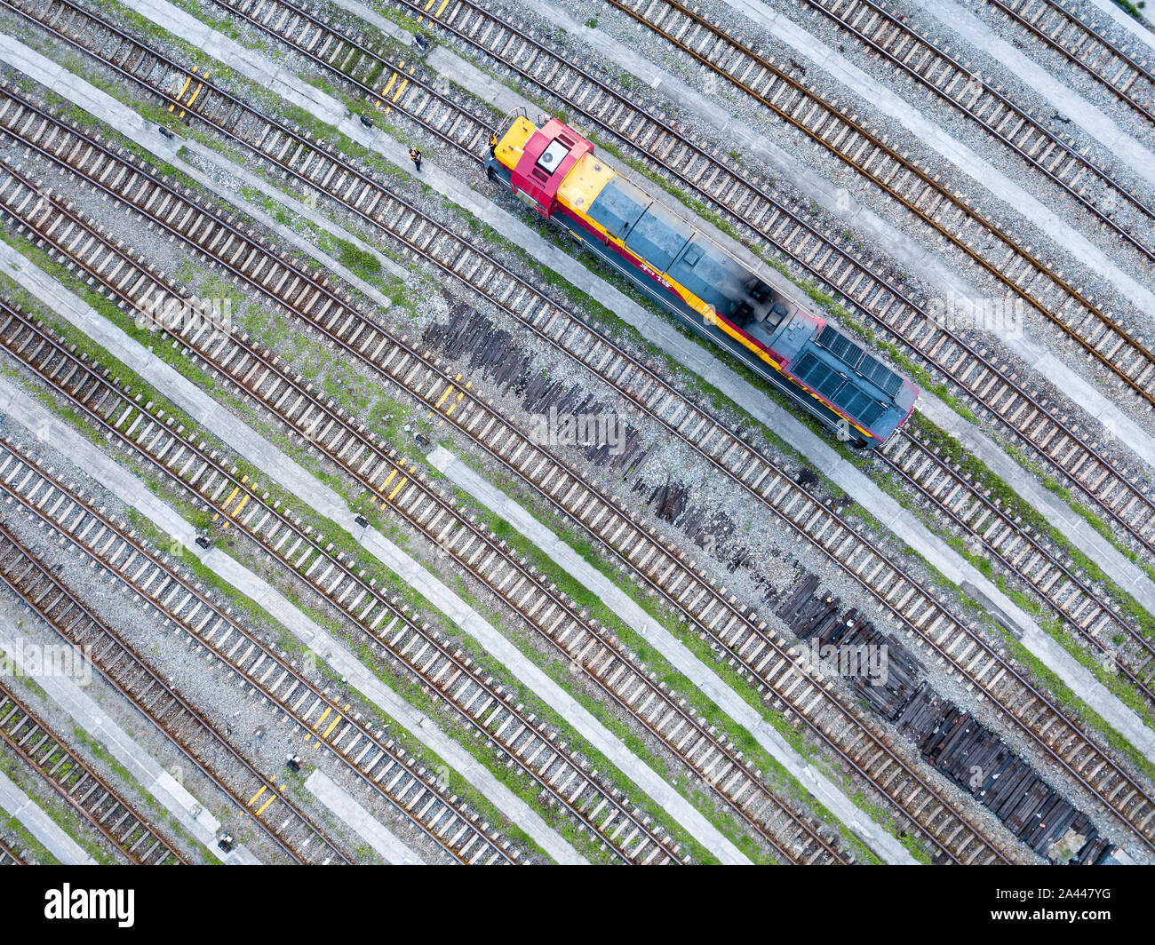 An aerial view of railway trains parked at a classification yard or ...