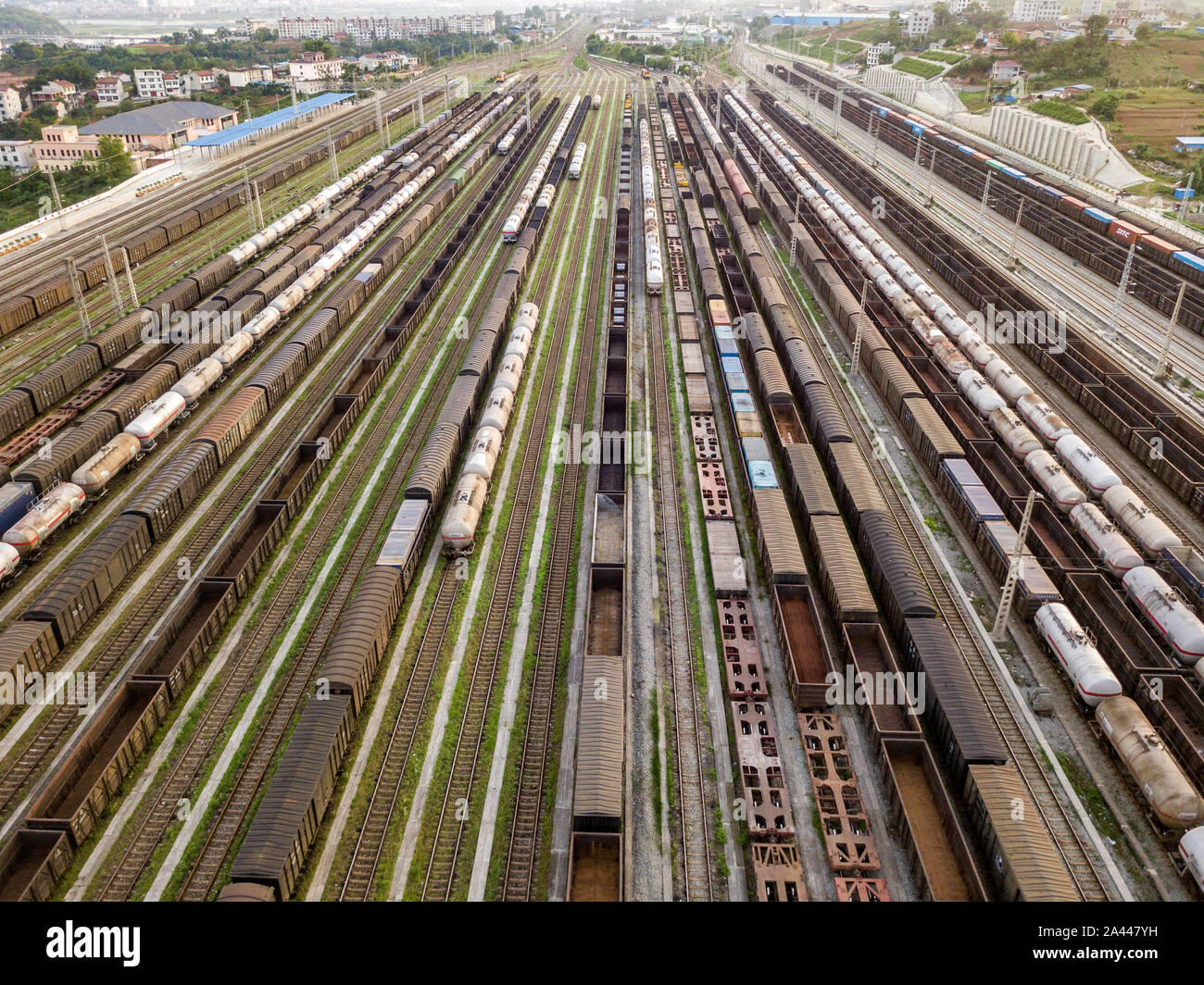 An aerial view of railway trains parked at a classification yard or ...