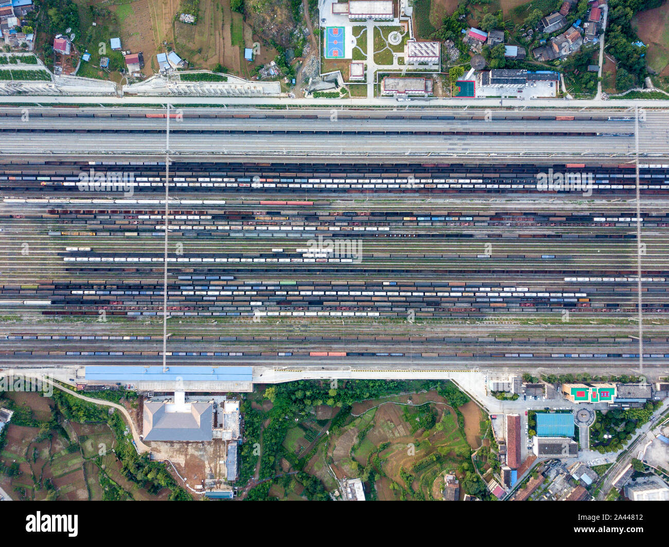 An aerial view of railway trains parked at a classification yard or ...