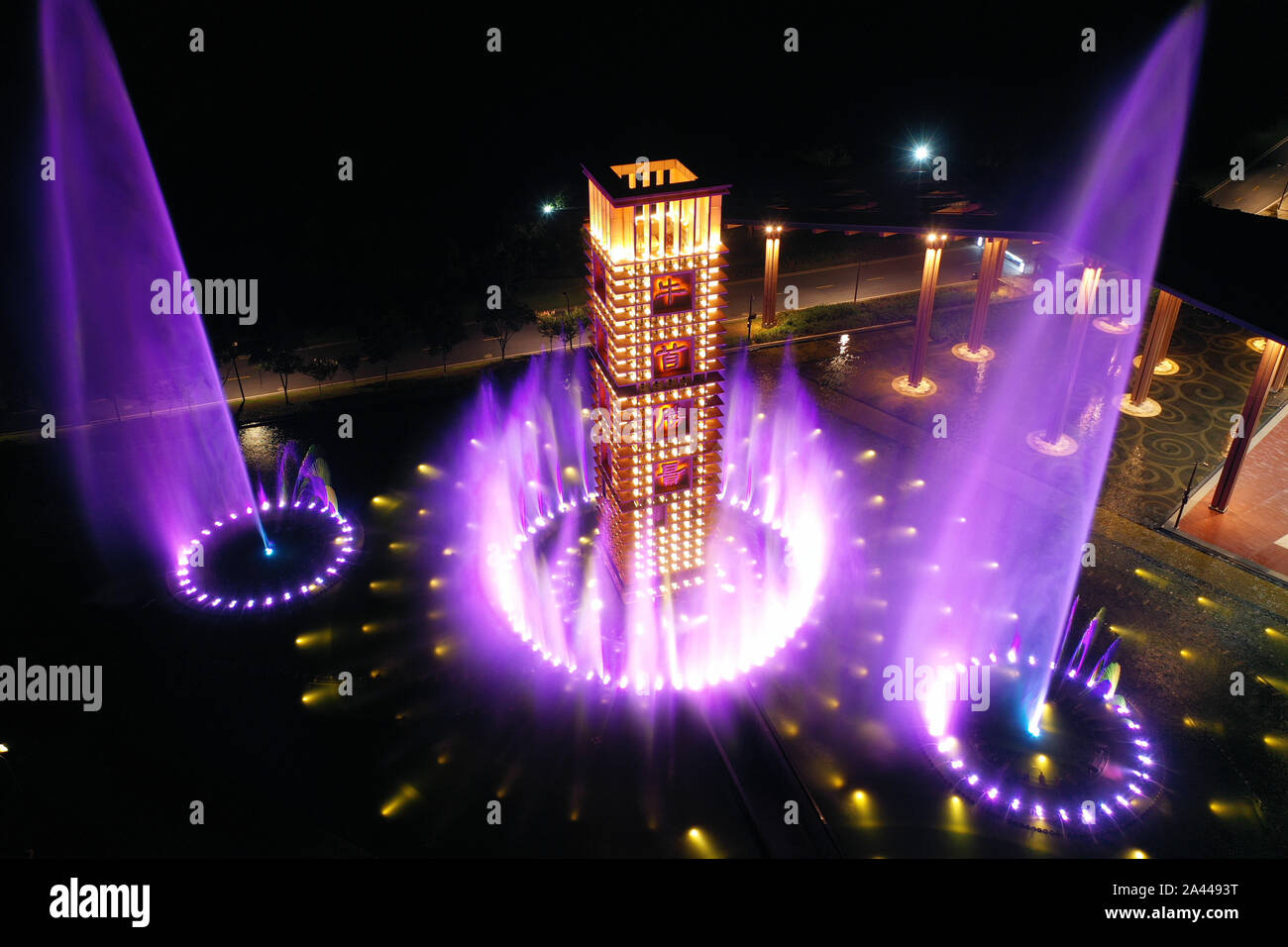 Water dances along as the music plays during a musical fountain light ...