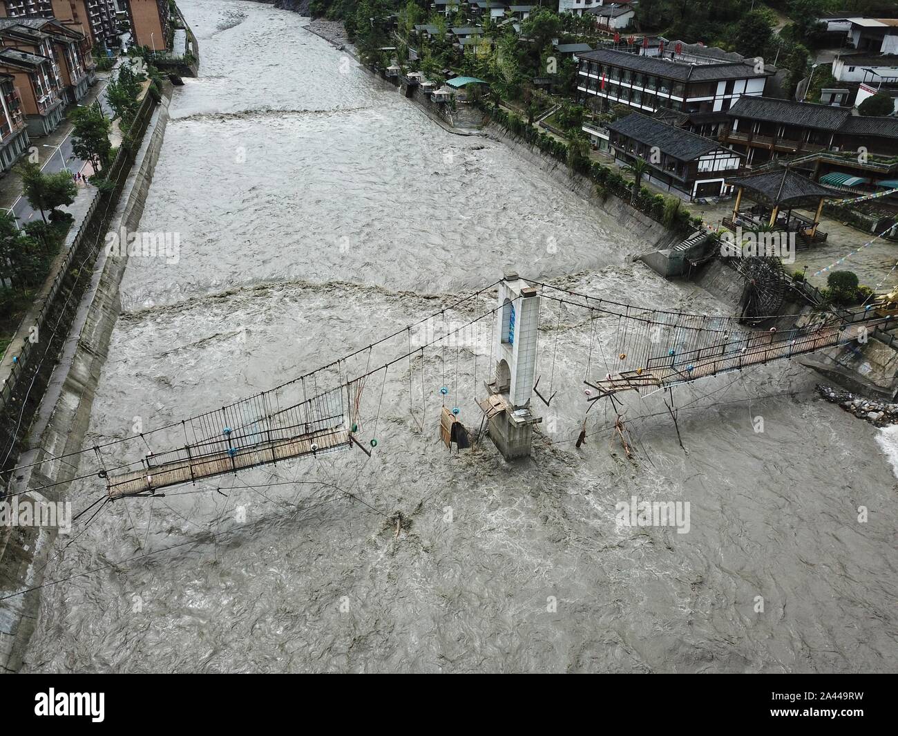 Roads, fields and residential buildings are covered with mud and ...