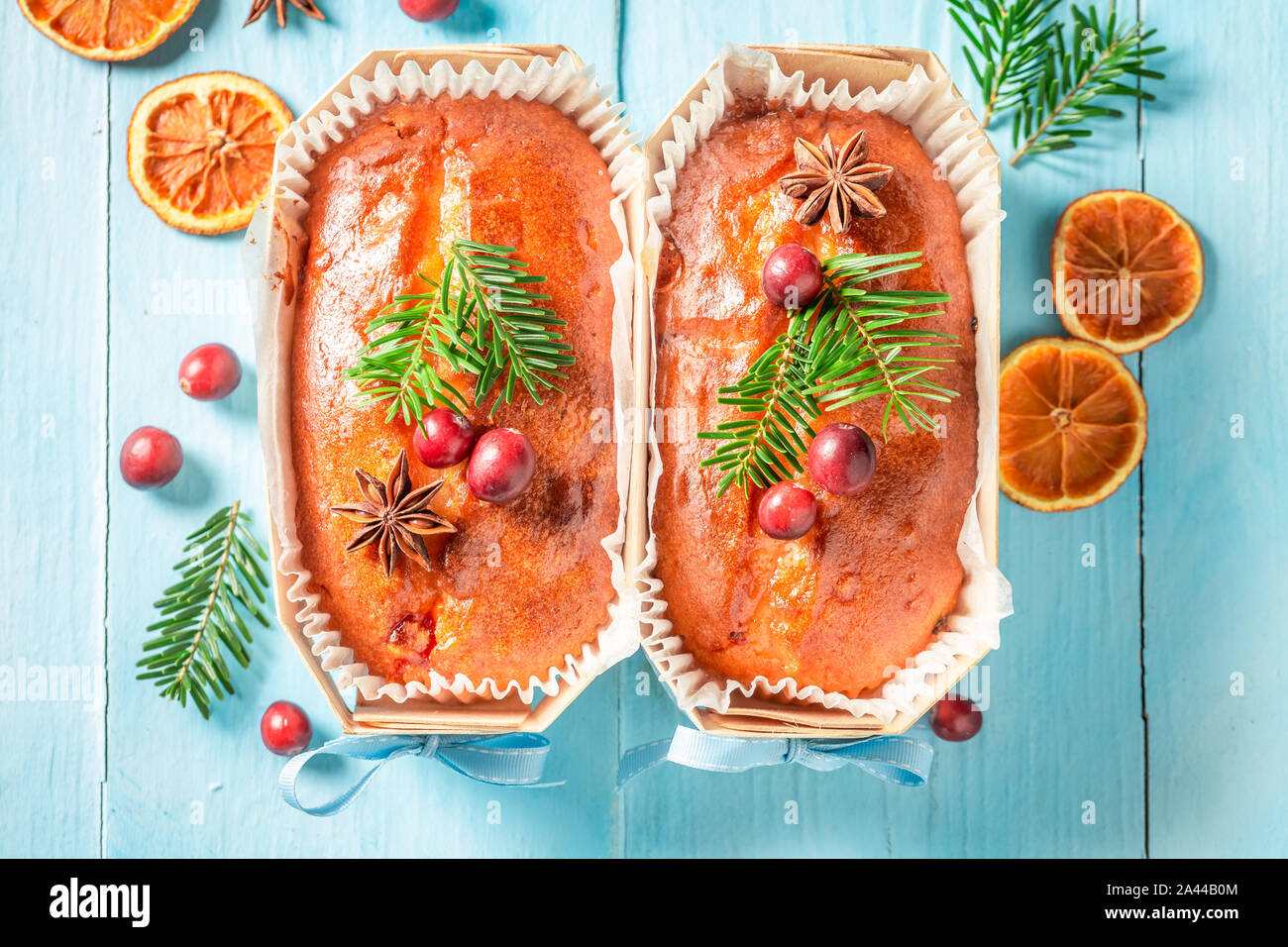 Top view of Fruitcake for Christmas on blue table Stock Photo - Alamy