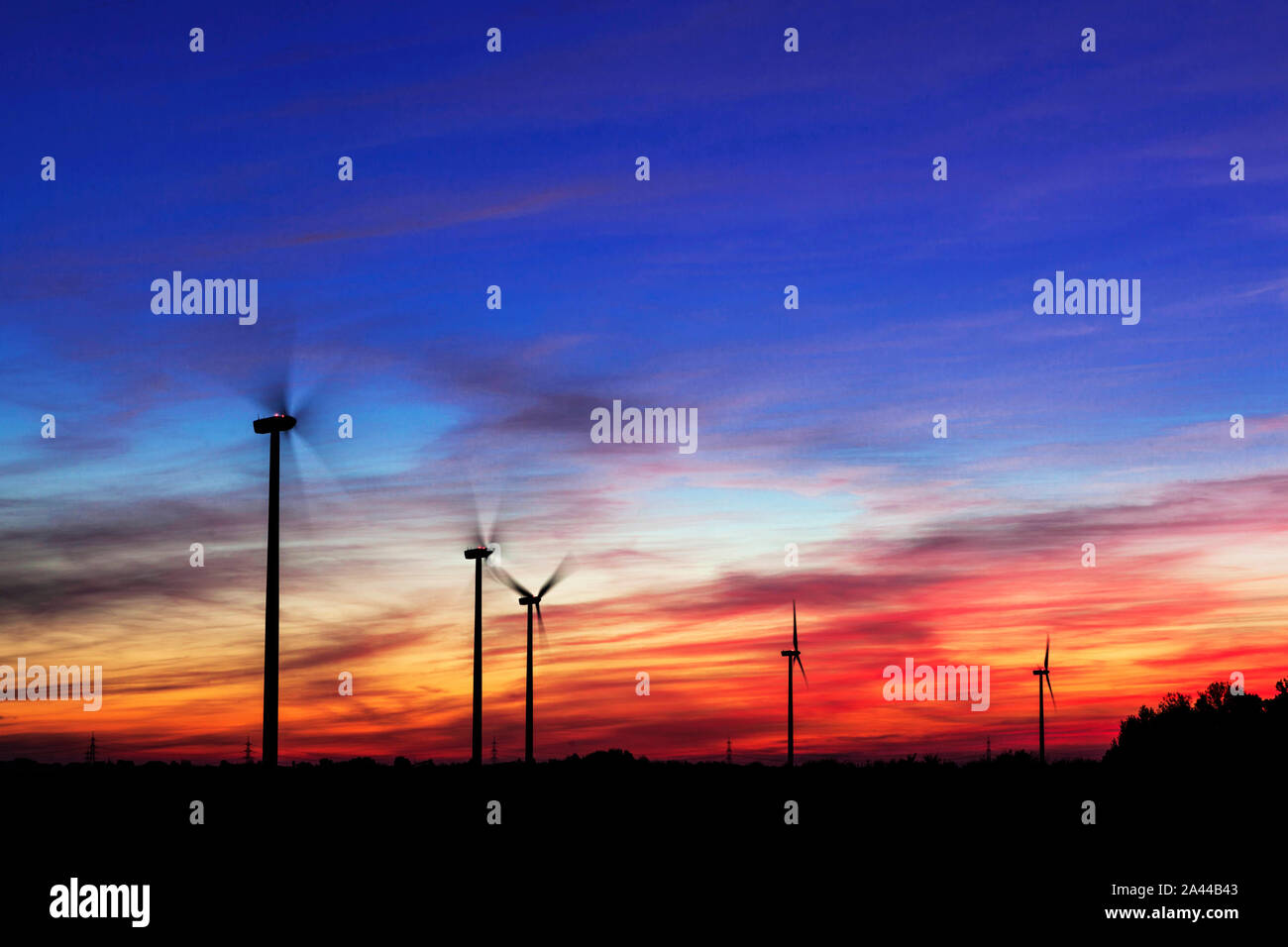 Wind turbine in the sunrise Stock Photo - Alamy