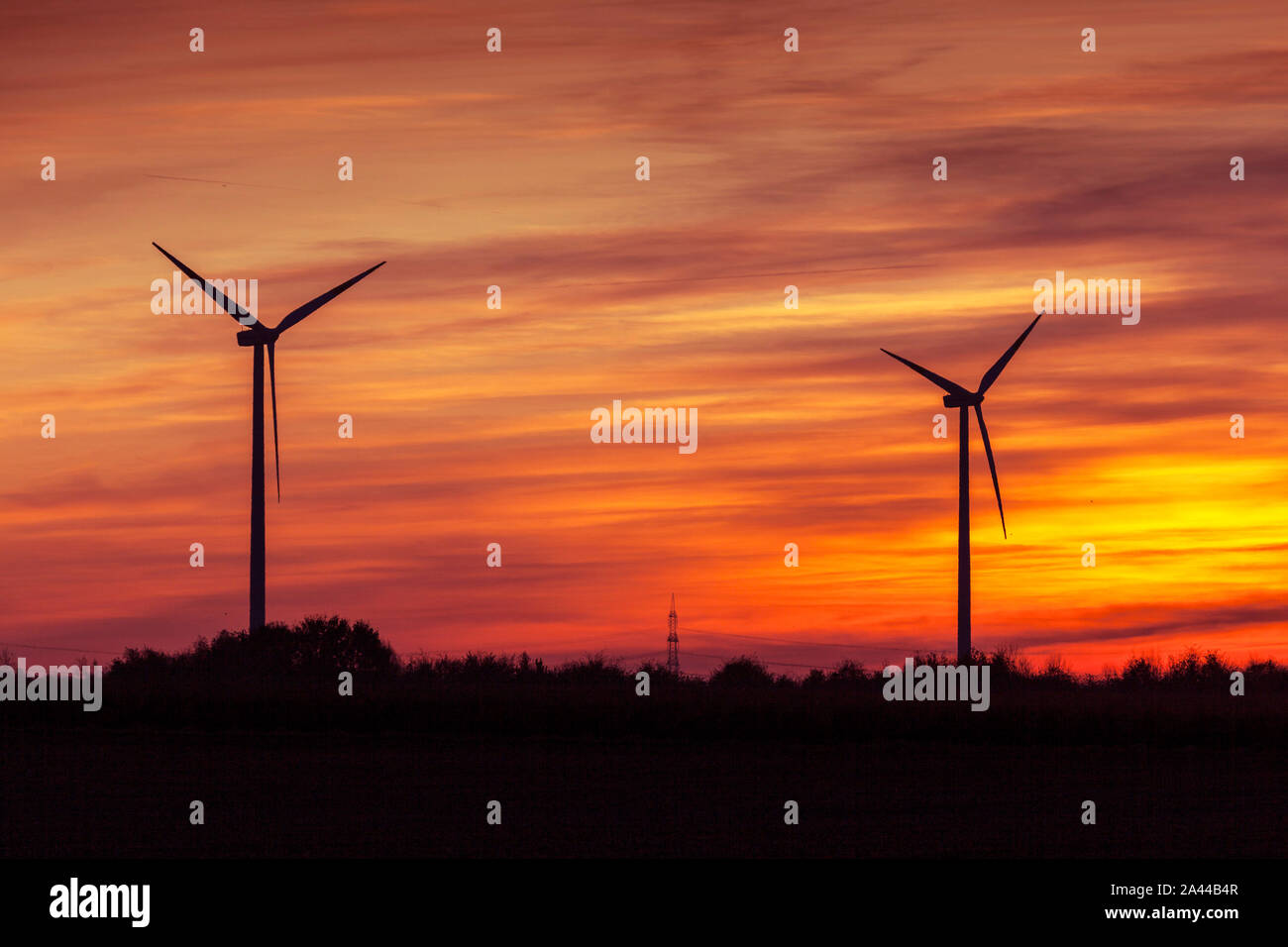 Wind turbine in the sunrise Stock Photo - Alamy