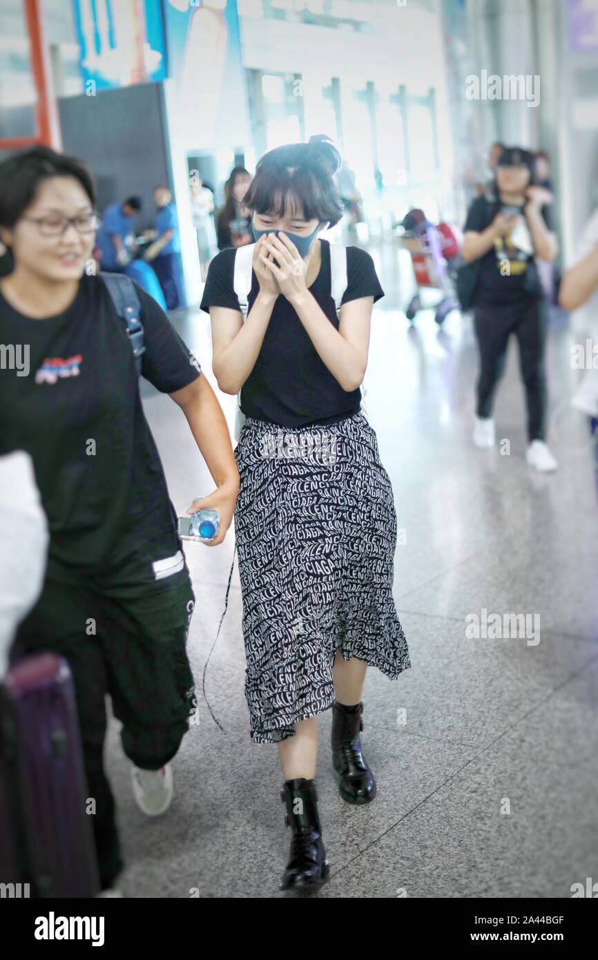 Chinese actress Jiao Junyan arrives at the Beijing Capital ...