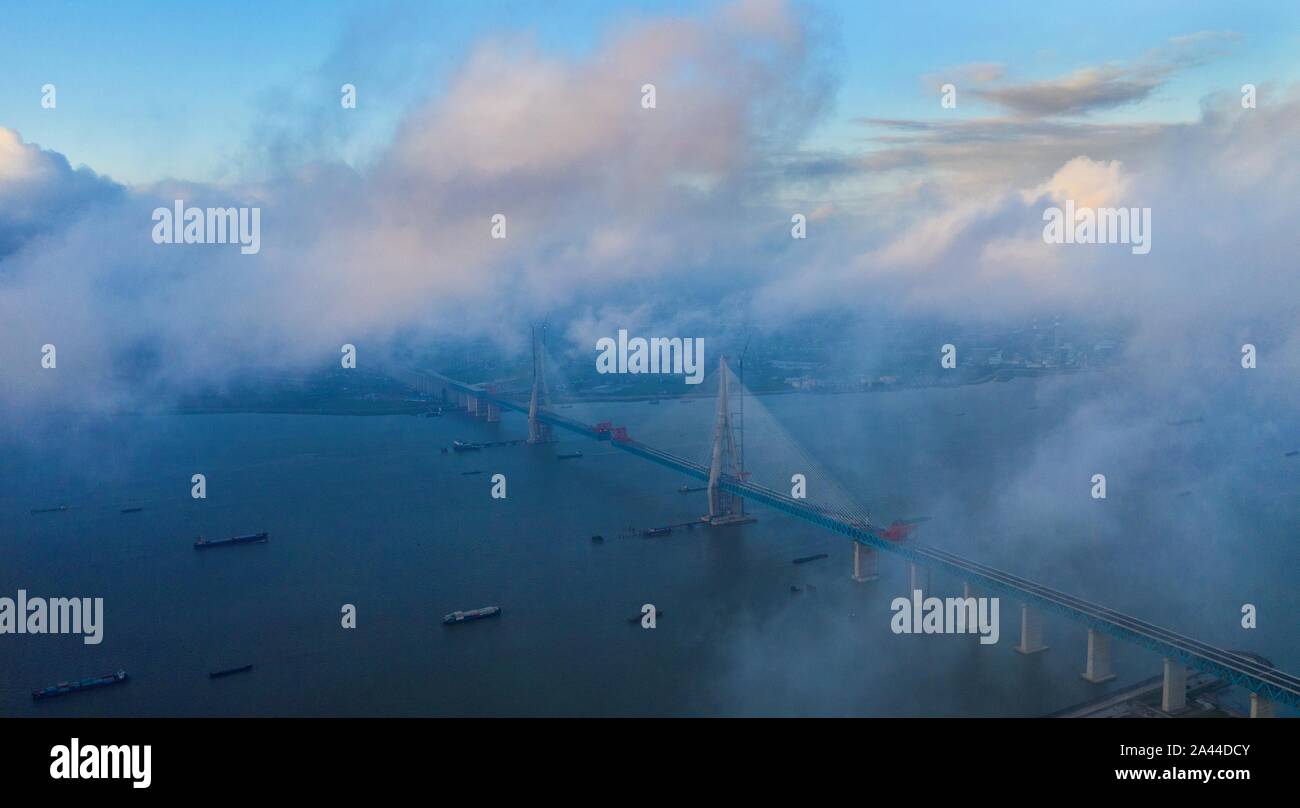 Aerial view of clouds above Shanghai-Nantong Yangtze River Bridge in ...