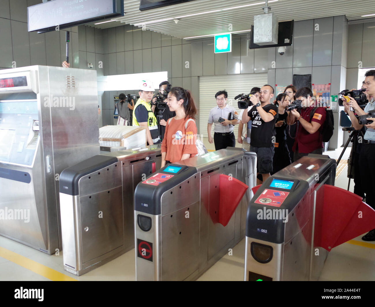 Chinese workers introduce the Light Rail Transit (LRT) system at the ...