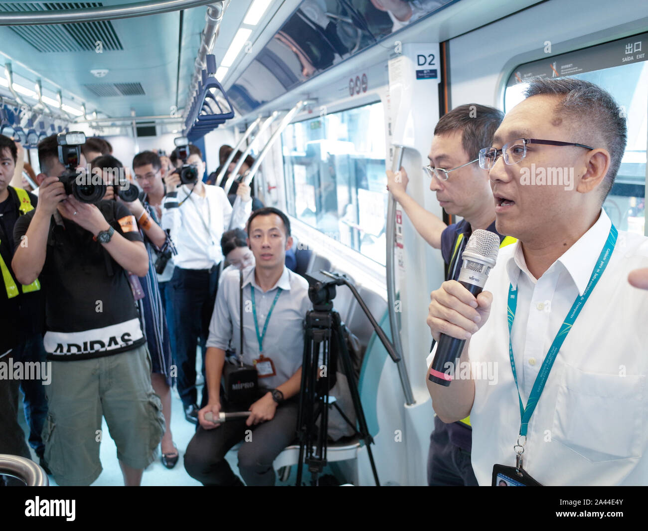 Chinese workers introduce the Light Rail Transit (LRT) system at the ...