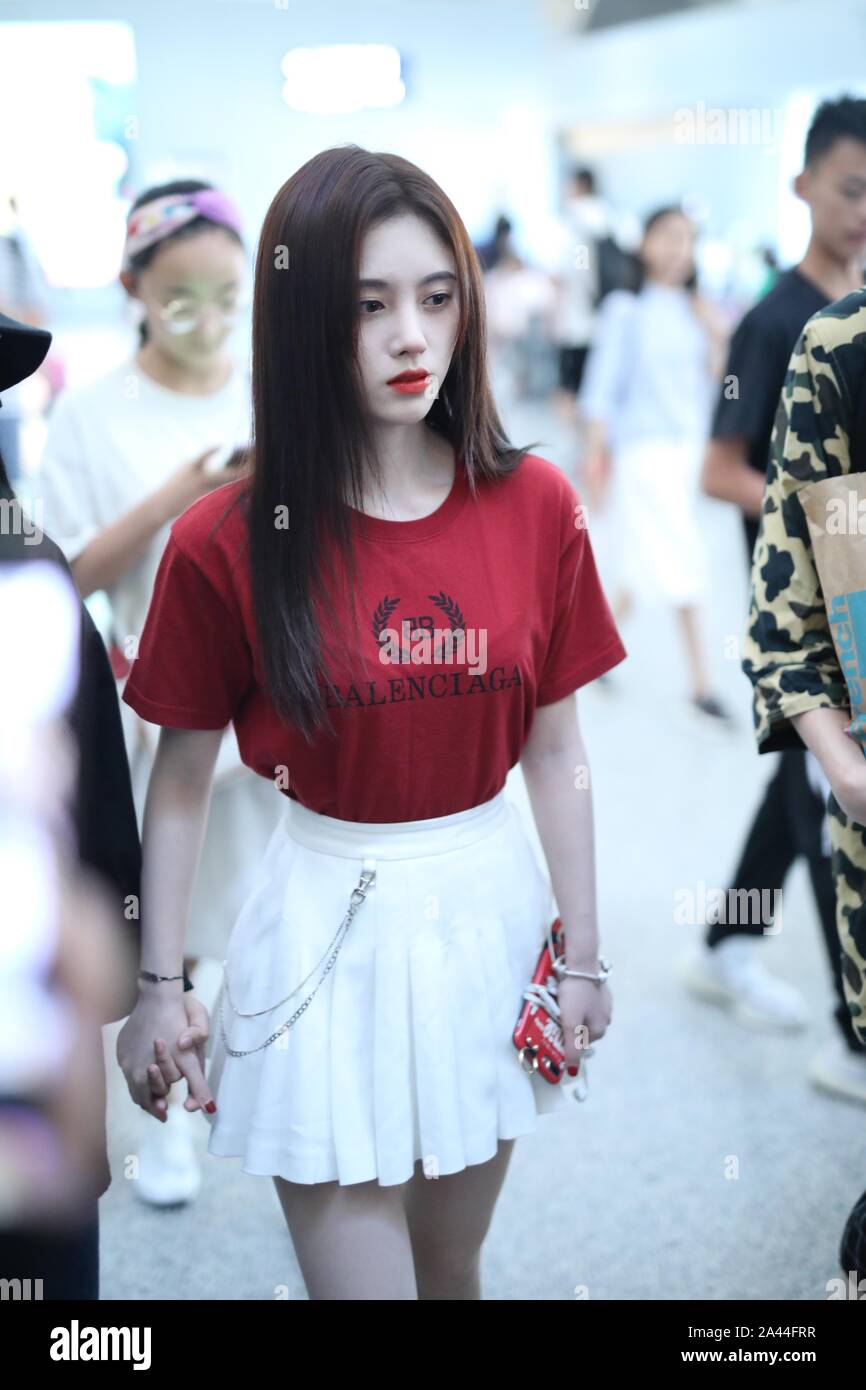 Chinese singer and actress Ju Jingyi arrives at the Beijing Capital ...