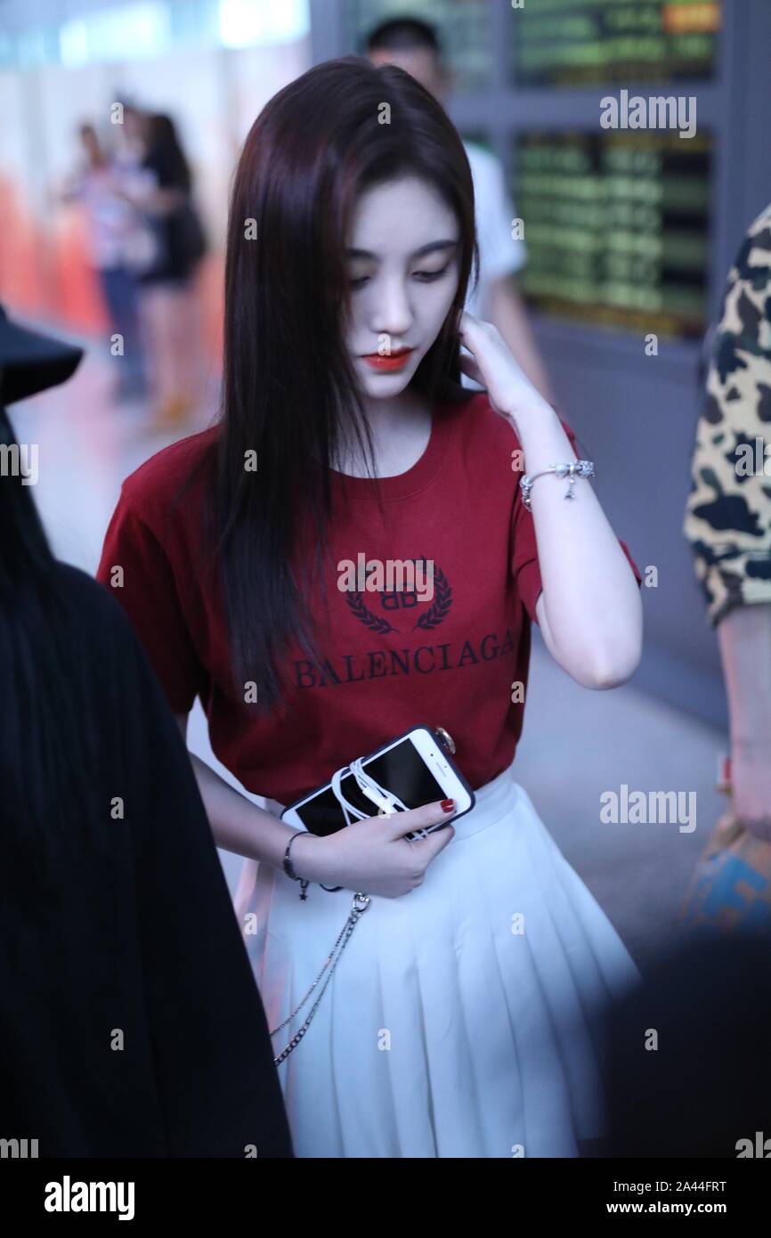 Chinese singer and actress Ju Jingyi arrives at the Beijing Capital ...