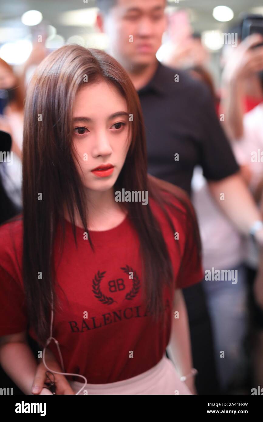 Chinese singer and actress Ju Jingyi arrives at the Beijing Capital ...