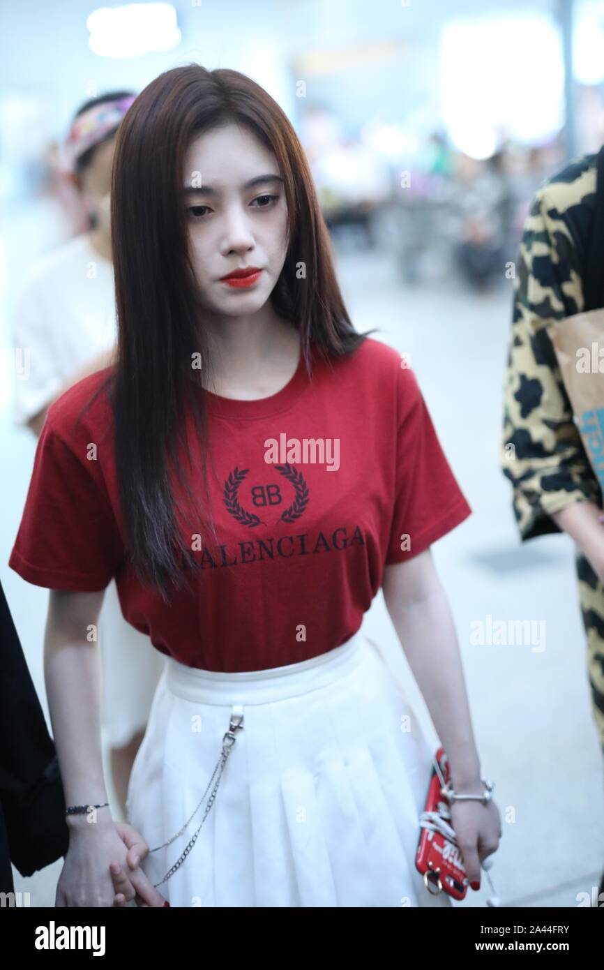 Chinese singer and actress Ju Jingyi arrives at the Beijing Capital ...