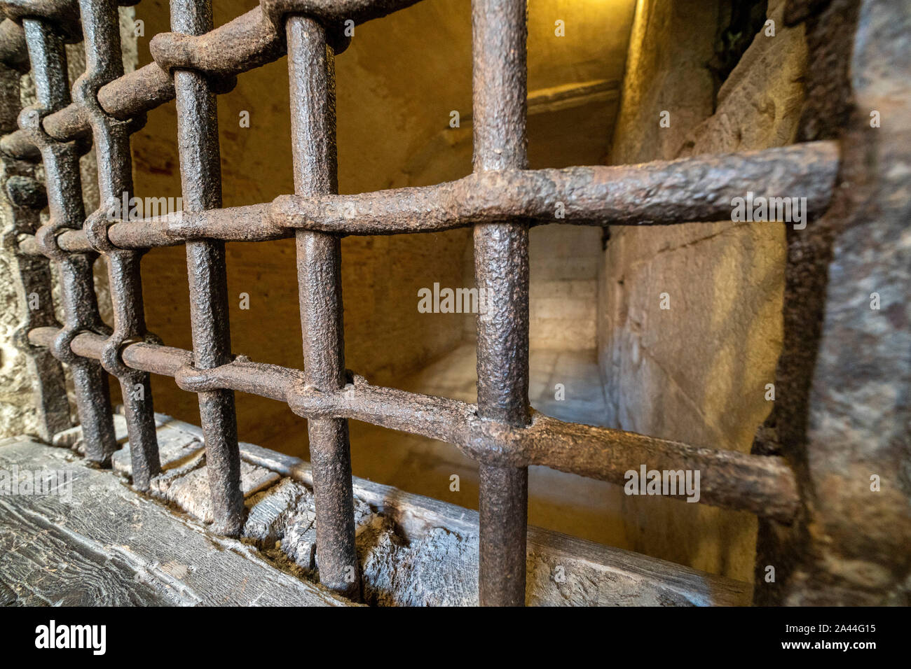 medieval prison cellar iron bars grate detail Stock Photo - Alamy
