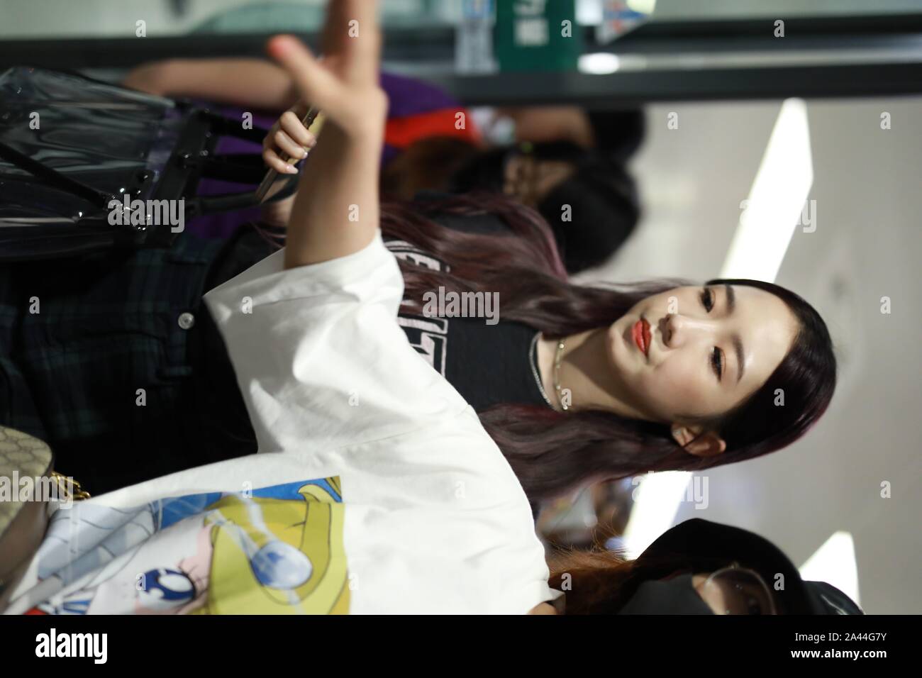 Meng Meiqi of Chinese idol group Rocket Girls 101 arrives at an airport ...