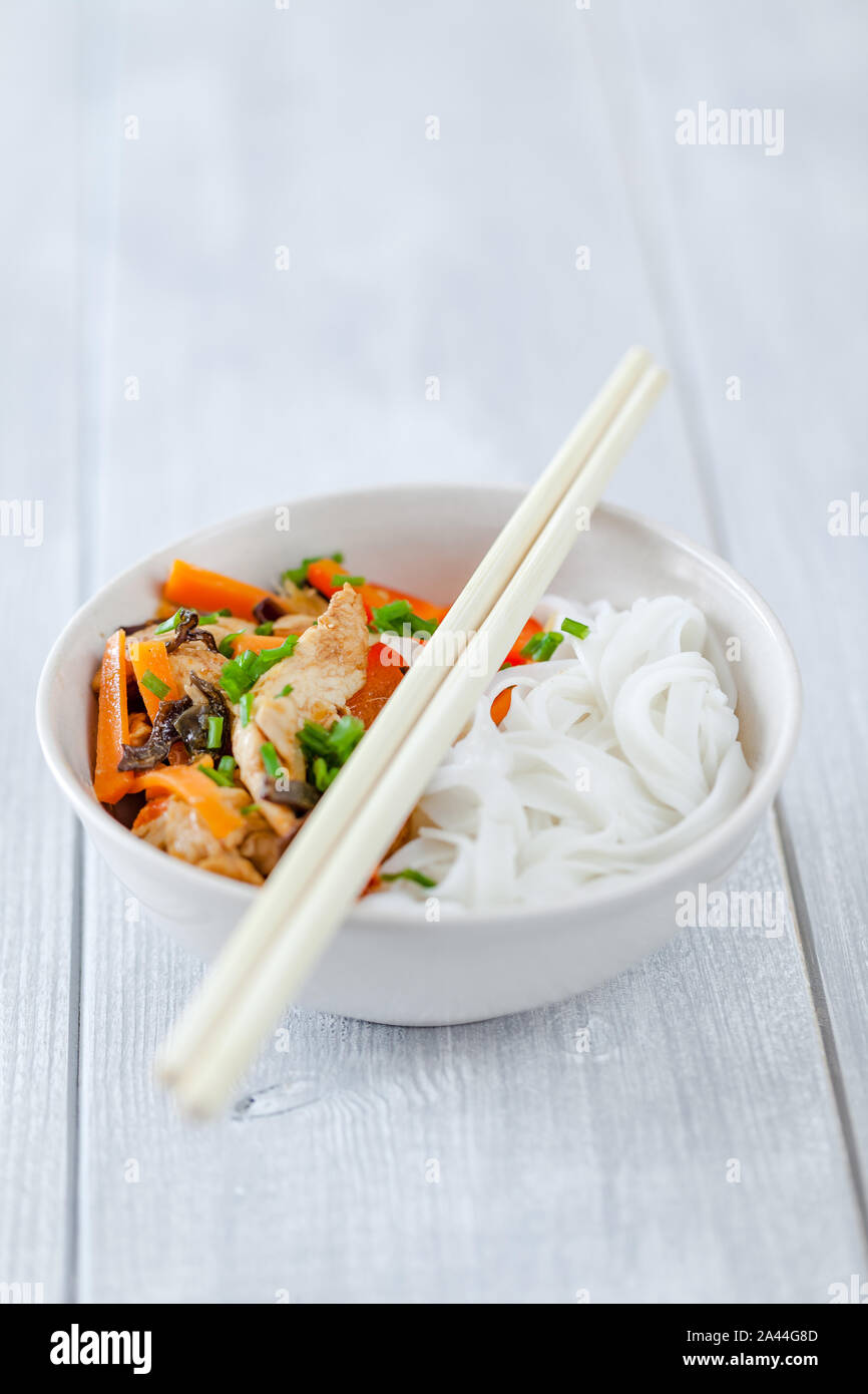Chinese food - chinese food bowl and chopsticks Stock Photo - Alamy