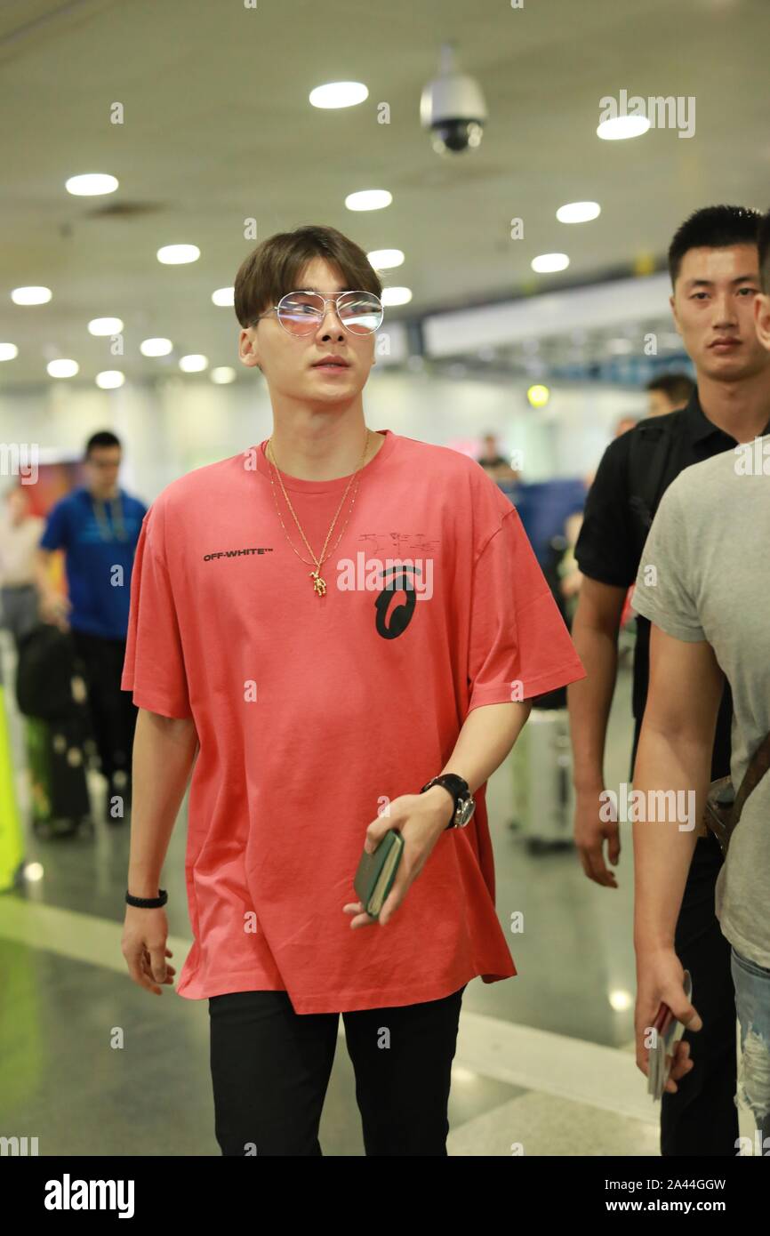 Chinese singer and actor Li Yifeng arrives at the Beijing Capital ...