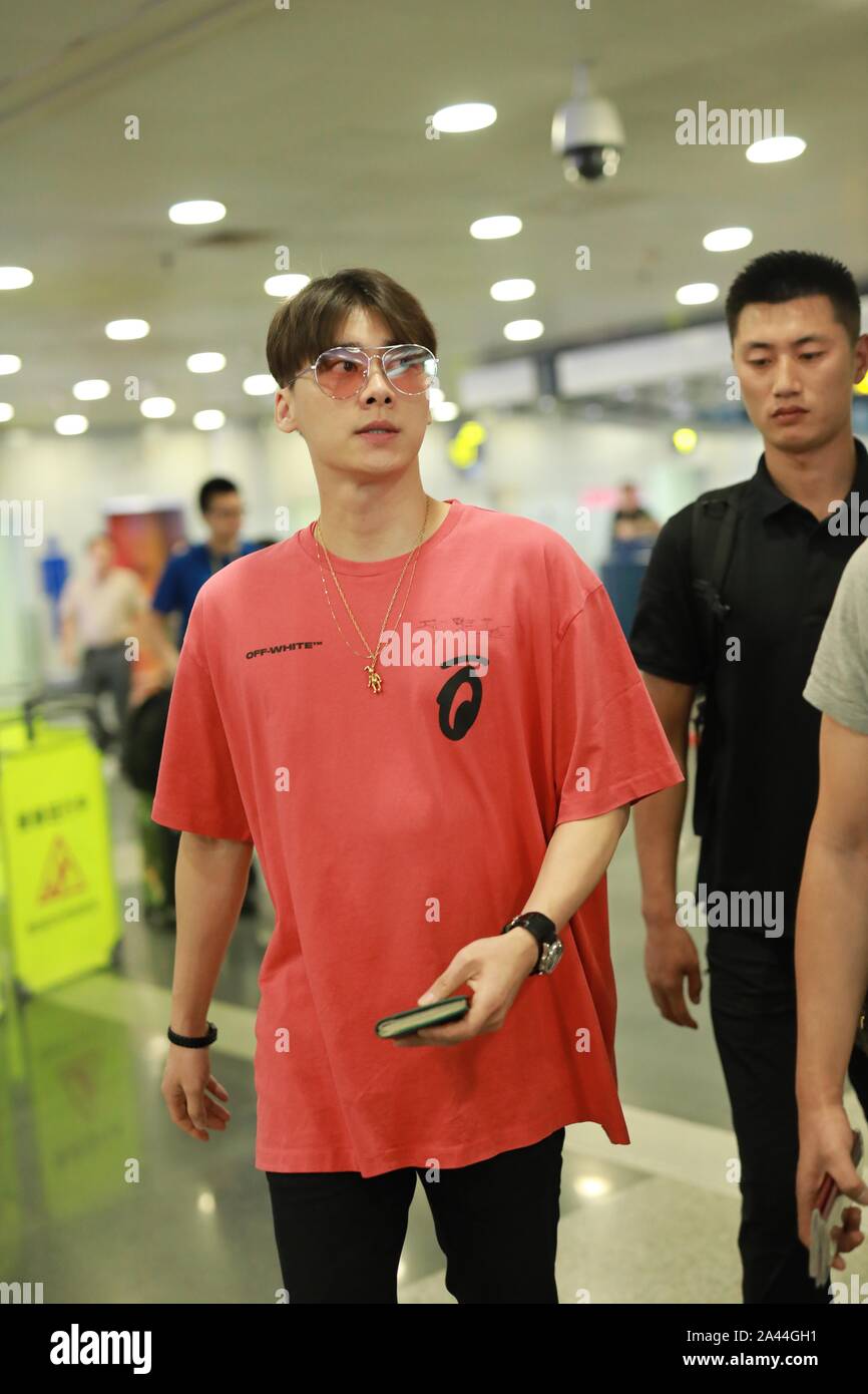 Chinese singer and actor Li Yifeng arrives at the Beijing Capital ...