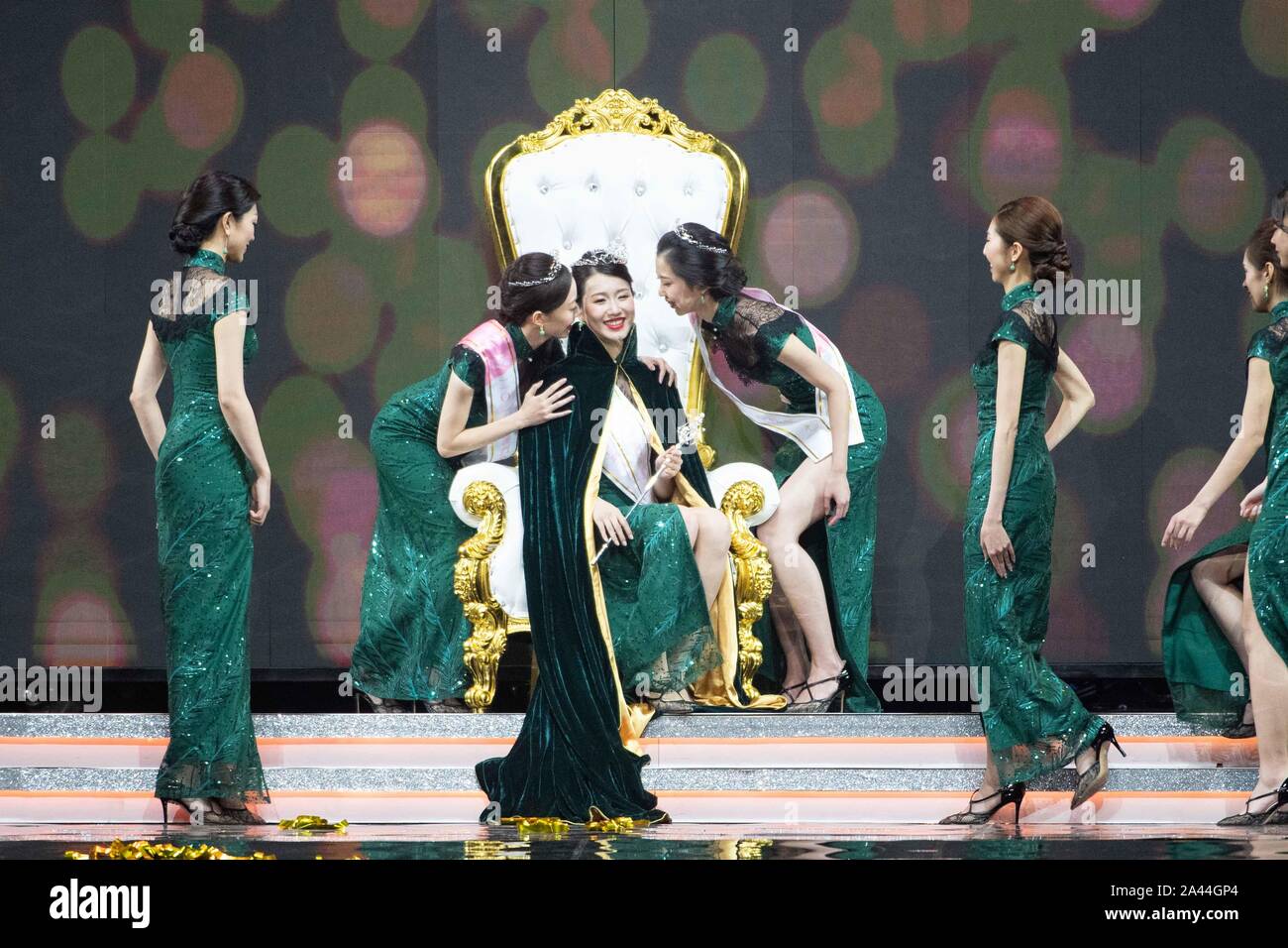 Contestants pose during the 2019 Miss Macau Pageant contest in Macau ...